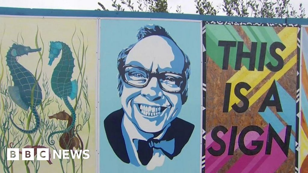 Morecambe Frontierland site fence gets 100 mural makeover - BBC News