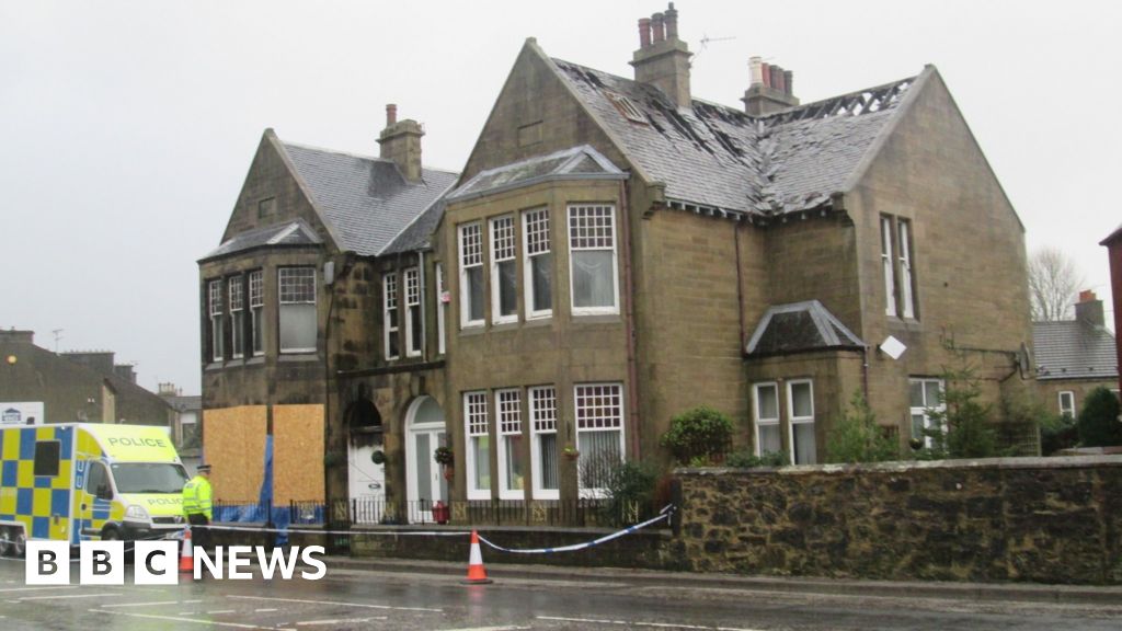 A woman has been named after house fire death in Dunipace - BBC News