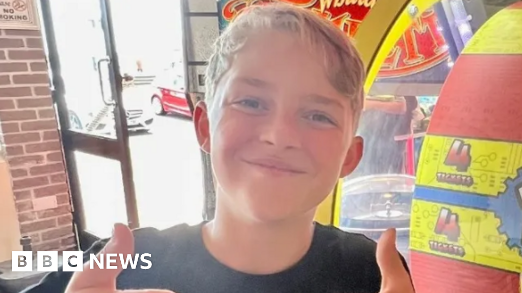 Boy, 12, 'may have tripped' in road death, inquest hears - BBC News