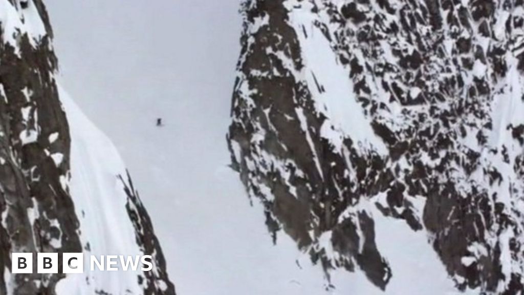 Skier survives 1,000 ft mountain fall - BBC News