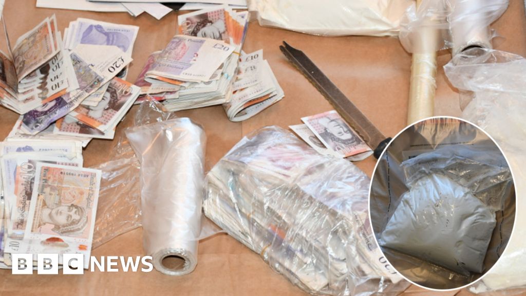 Bridgend's 'largest' stash of white powder sized in drug raids - BBC News