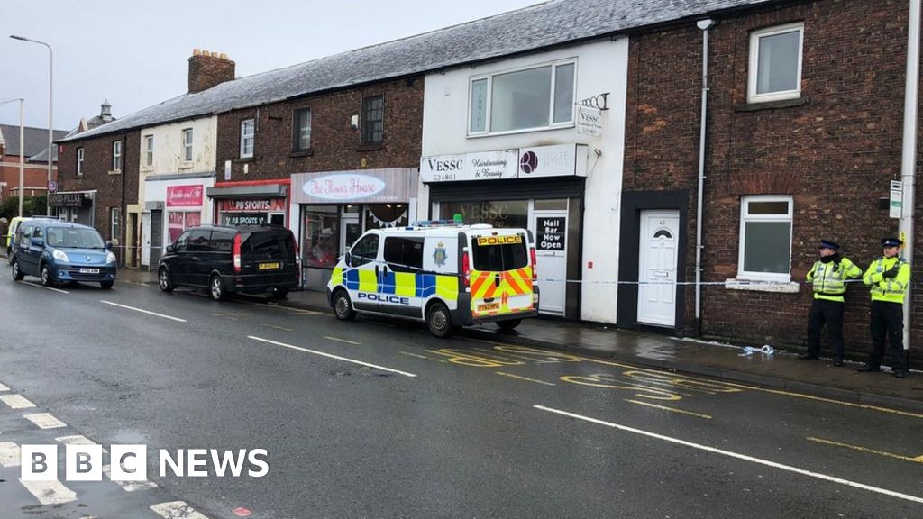 Arrest after man 'set alight in Carlisle shop'