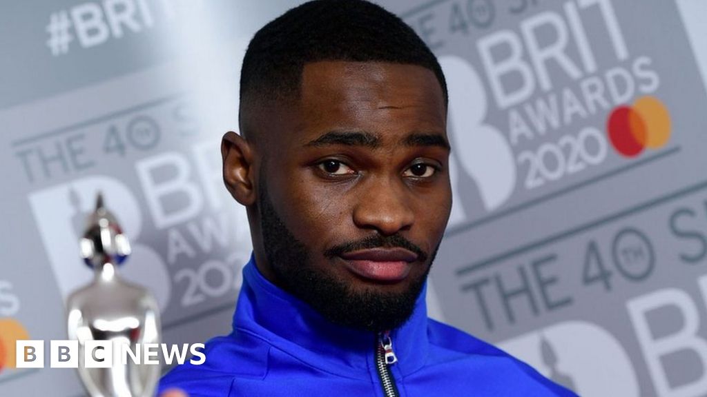 Brits 2020: Dave wins album of the year and calls PM 'racist' - BBC News