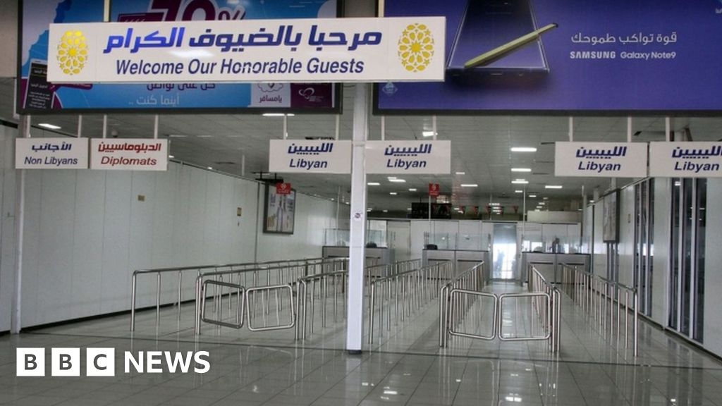 Libya's Tripoli airport diverts flights after rocket attack - BBC News