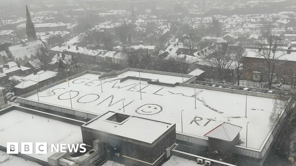 Sheffield 'get well soon' message carved on snowy hospital roof - BBC News