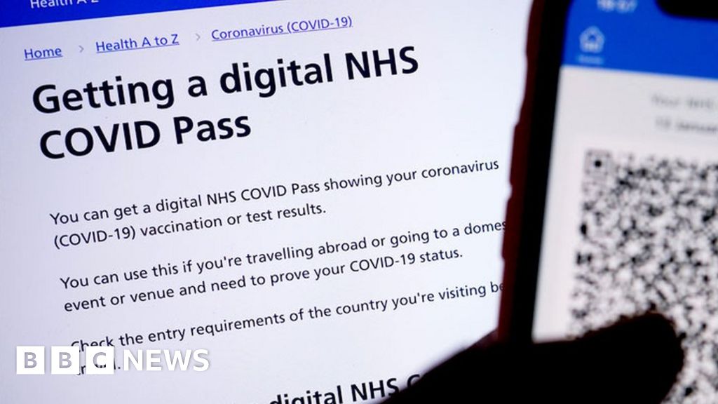 Covid pass starts in England despite biggest rebellion of Johnson era