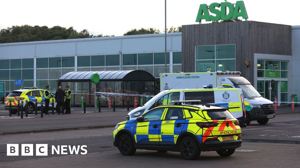 Woman arrested after unexplained death of Asda worker - BBC News