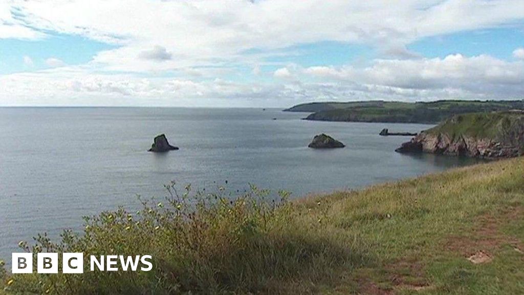 Three people rescued after boat catches fire off Brixham