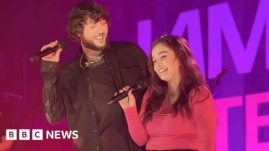 James Arthur fan from Harlow sings with him on stage in Paris
