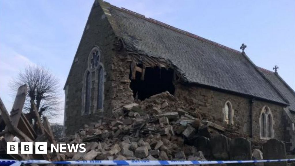 Sniffer dogs search High Toynton church tower rubble