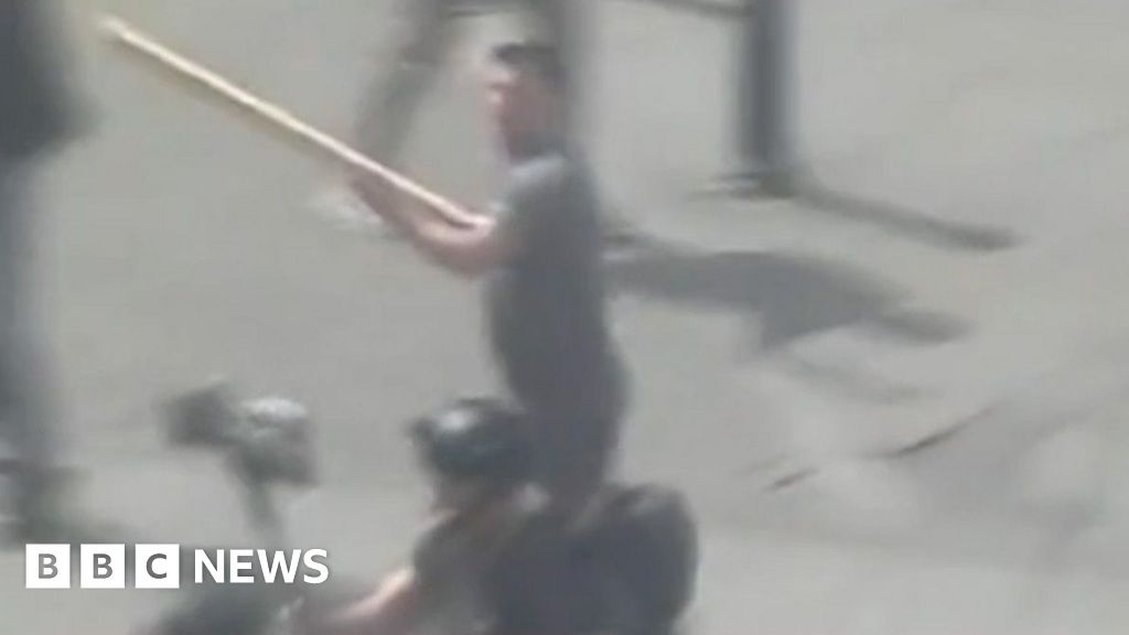 Further footage released of people wanted over Manchester riots - BBC News