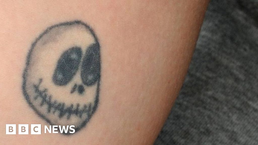 Benjamine Webb: Tattoos of paedophile on film led to capture - BBC News