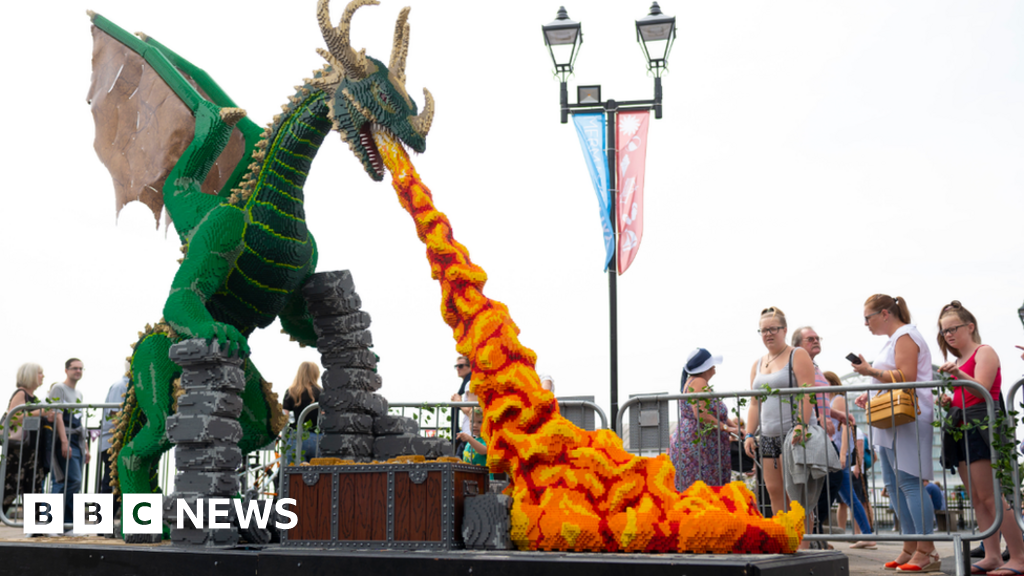 Cardiff Bay Lego show displays fire-breathing 11ft dragon - BBC News