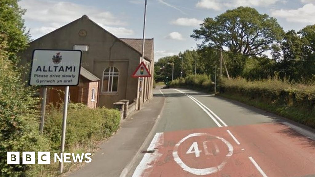 Woman hurt after two-car crash at Alltami, near Mold - BBC News