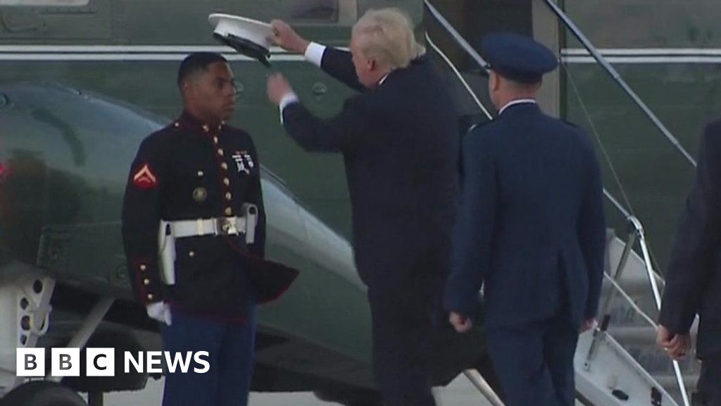 Donald Trump, a hat and the wind