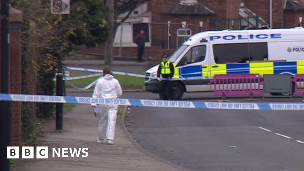 Rotherham: Two held on suspicion of murder over street death - BBC News