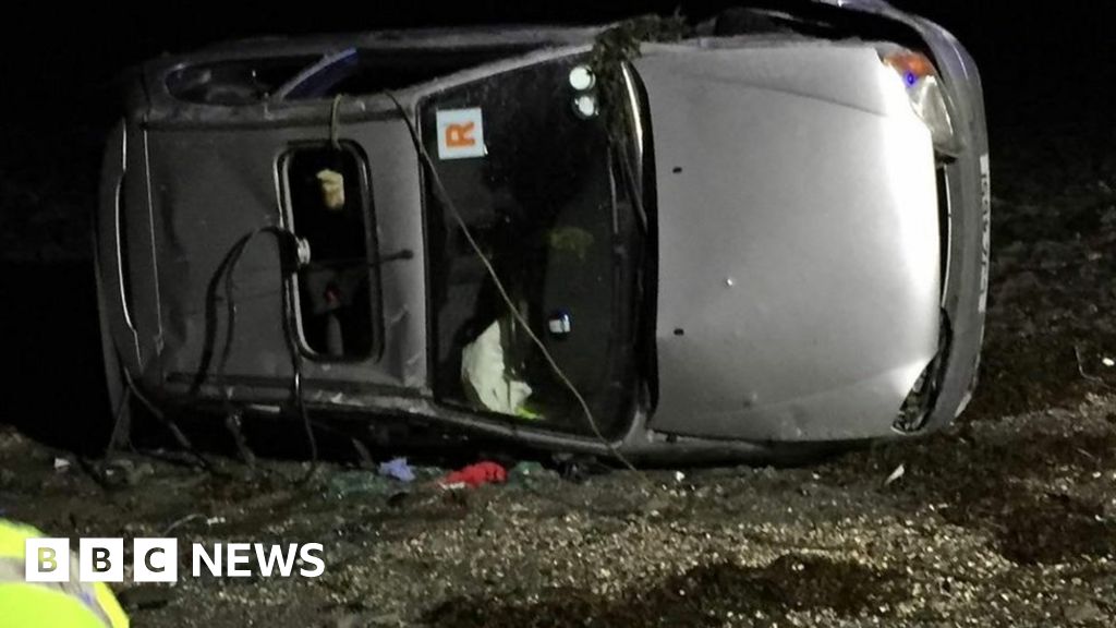 Portaferry Road: Car crashes through wall at Strangford Lough - BBC News