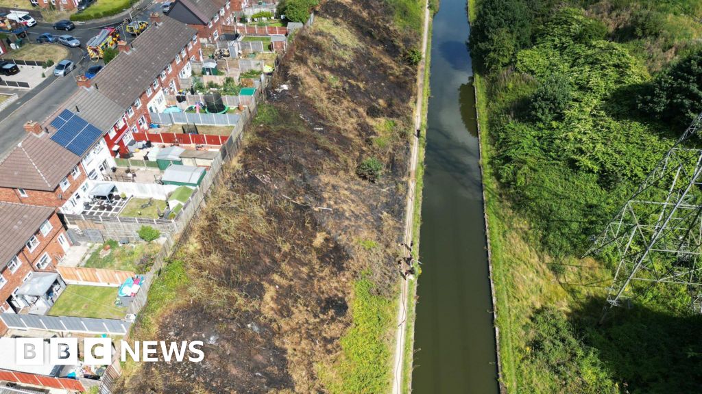 Large fire rips through embankment yards from homes in Wednesbury - BBC ...