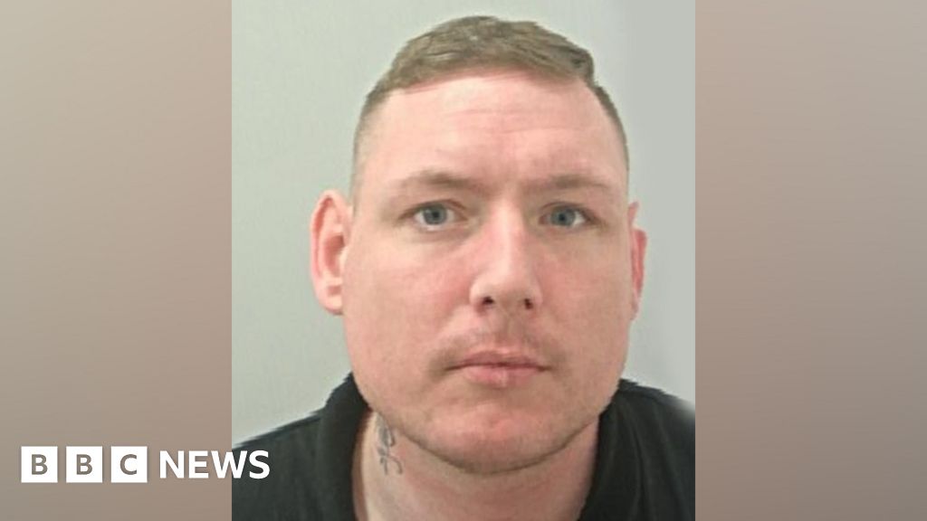 Man who attacked shopkeeper with broom in phone row jailed