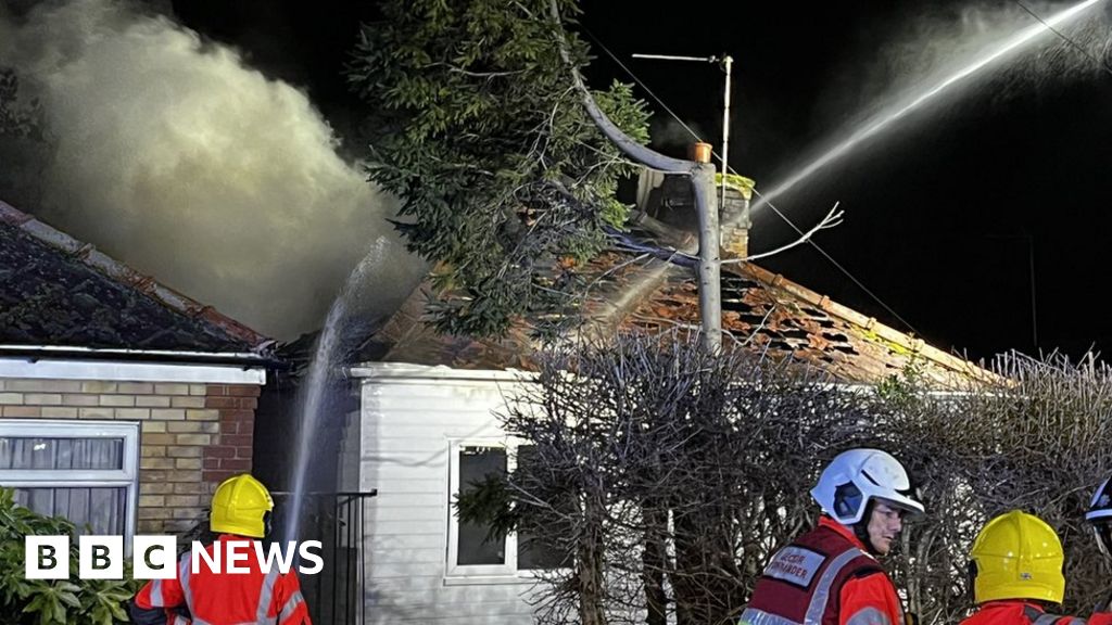 Homes evacuated as crews tackle a large fire in March