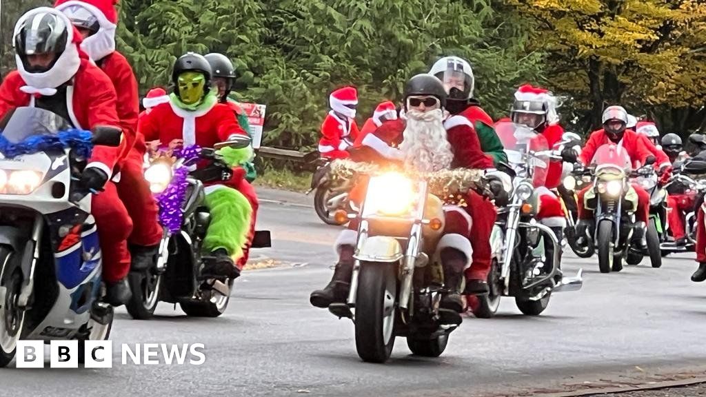 Santa motorbike riders take to roads for charity - BBC News