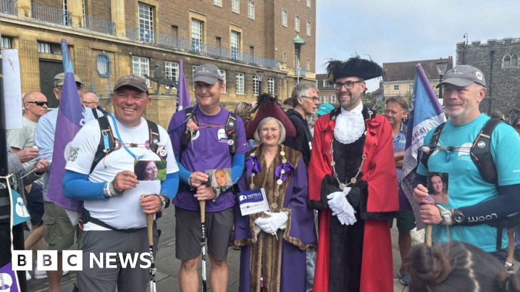 Three Dads Walking complete journey in Norwich - BBC News