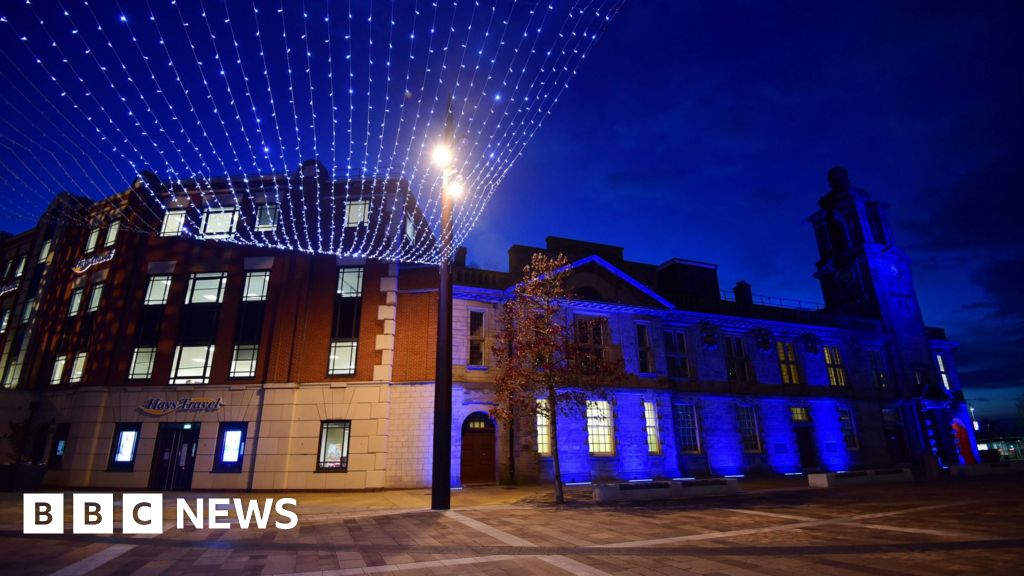 Sunderland landmarks lit up in honour of travel firm boss - BBC News