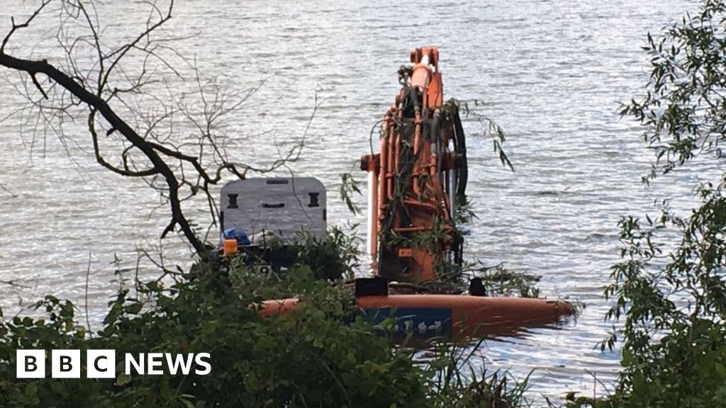 Digger driven into lake at Irthlingborough Lakes and Meadows nature reserve
