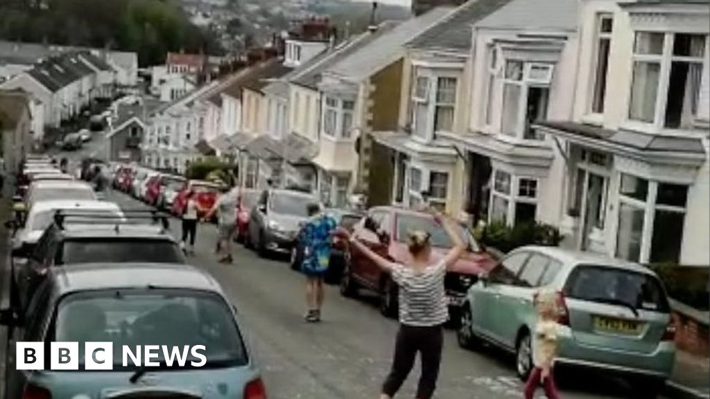 Coronavirus: Street party held for residents social distancing