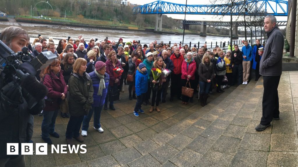 Missing Sally Allan: Family lay flowers at Quayside - BBC News