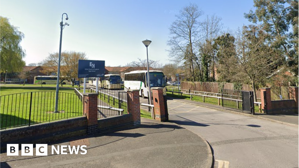 Esher: School lockdown lifted after armed police response - BBC News