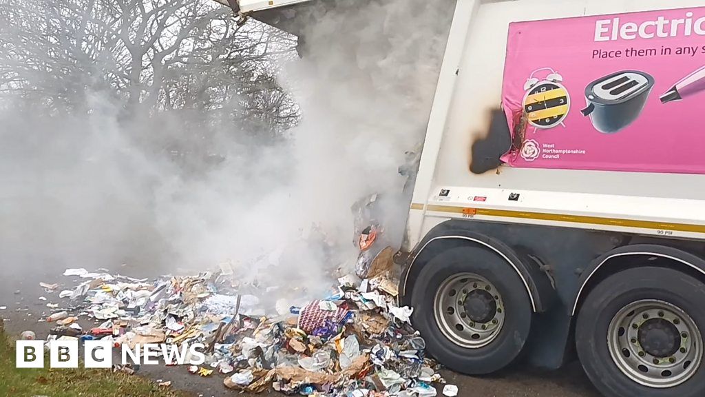 Northamptonshire bin lorry sheds load as fire takes hold