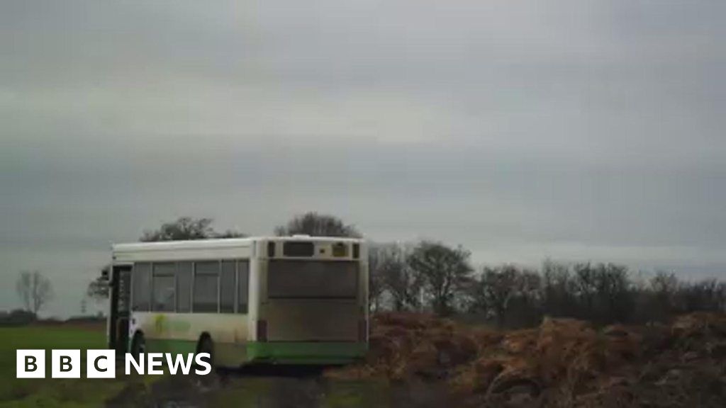 'Lost' bus ends up in manure heap on Thaxted farm - BBC News