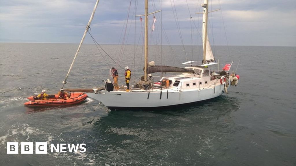 Yacht rescue: Four people rescued off Antrim Coast - BBC News