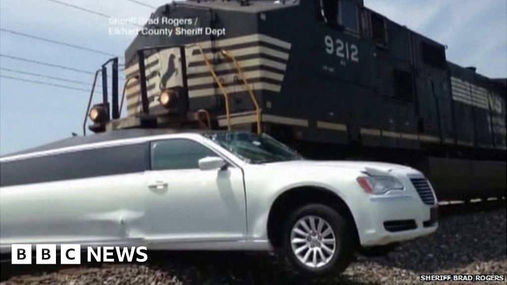 Train smashes into limousine stuck on track in Indiana - BBC News