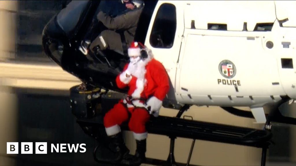 Hang on, what's Santa doing on a helicopter? - BBC News