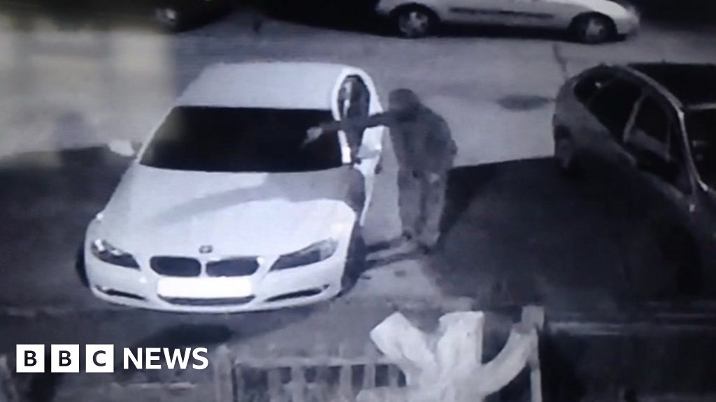 CCTV shows moment new BMW is set alight in arson attack - BBC News