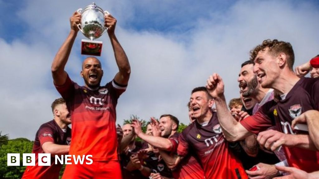 FC Isle of Man celebrating Challenge Cup win in first season