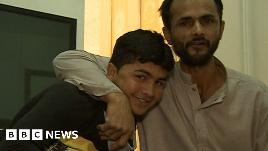 Refugee reunited with father gives thanks to singer - BBC News