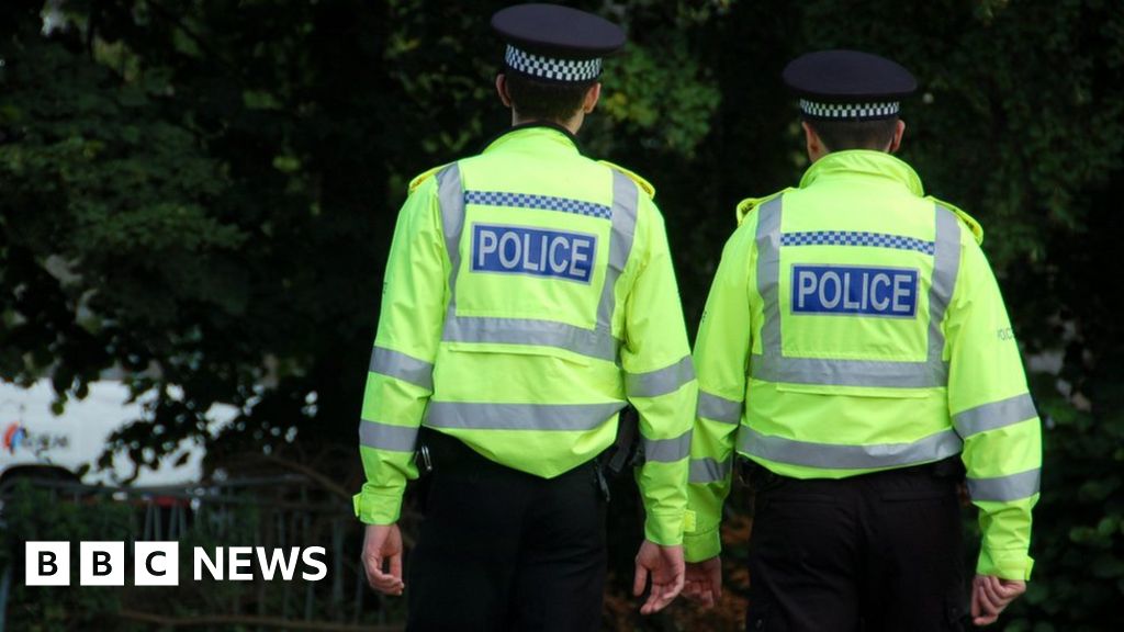 Men admit armed robbery at police officers' home in Edinburgh