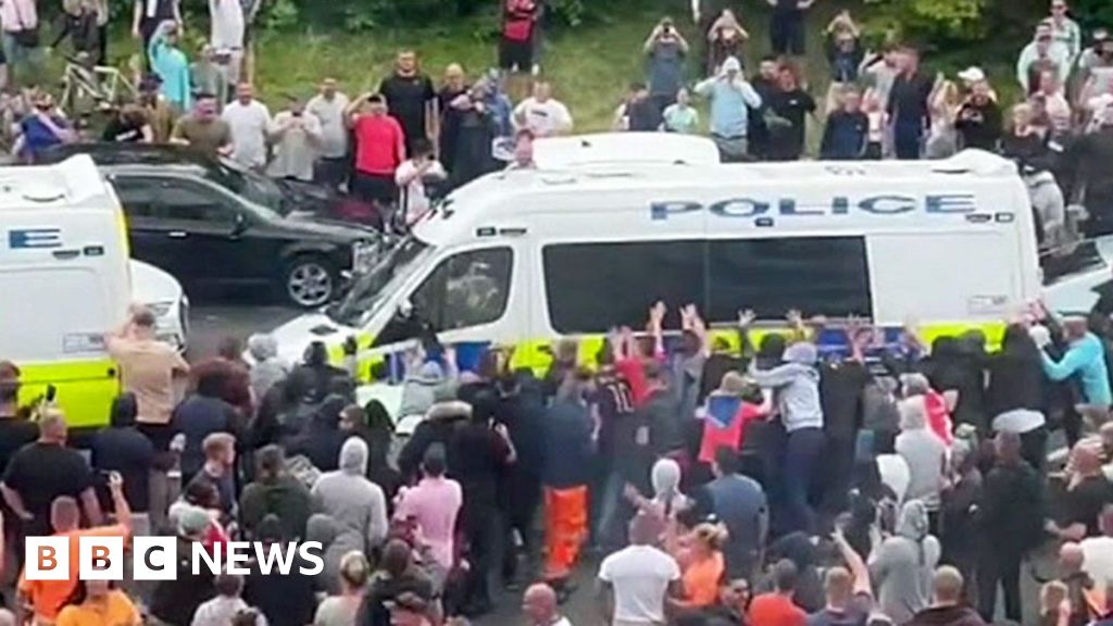 Rotherham: Footage shows panic inside asylum hotel during riot - BBC News