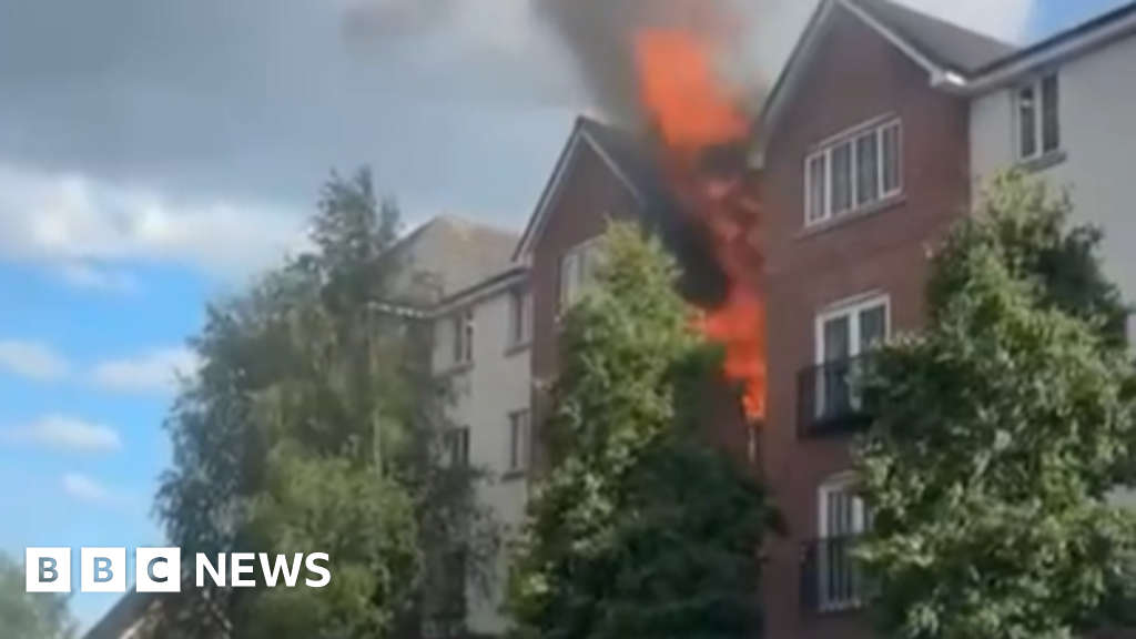 Warrington flats fire sees 50 people rescued from blaze