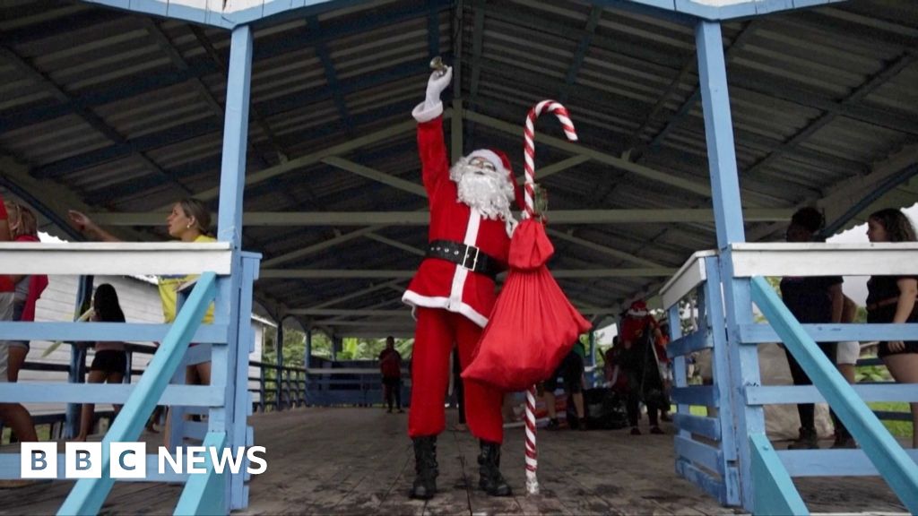 Santas spread Christmas cheer around the world - BBC News