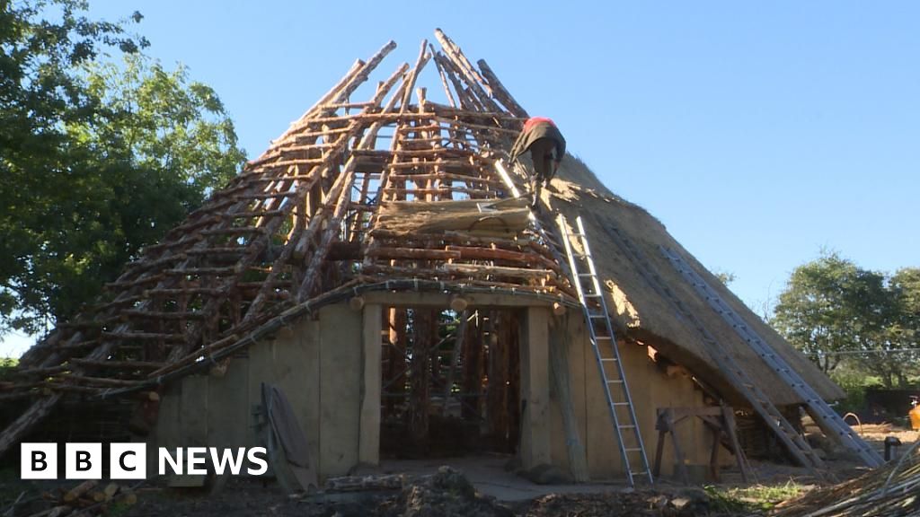 Whithorn Iron Age roundhouse works in full swing - BBC News