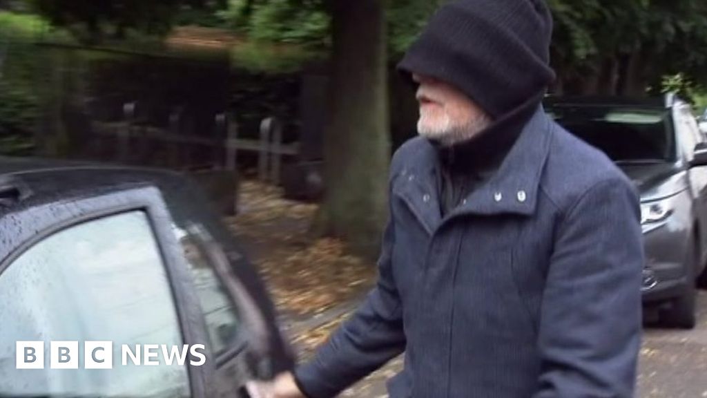 Football abuse accused Robert Higgins arrives at court