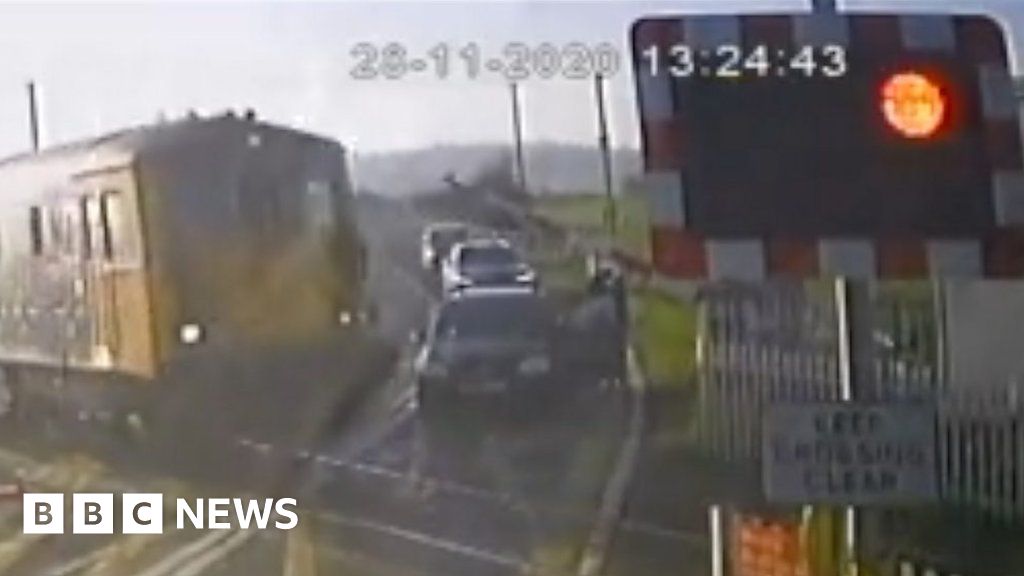 Train misses car at Rye level crossing by a few feet