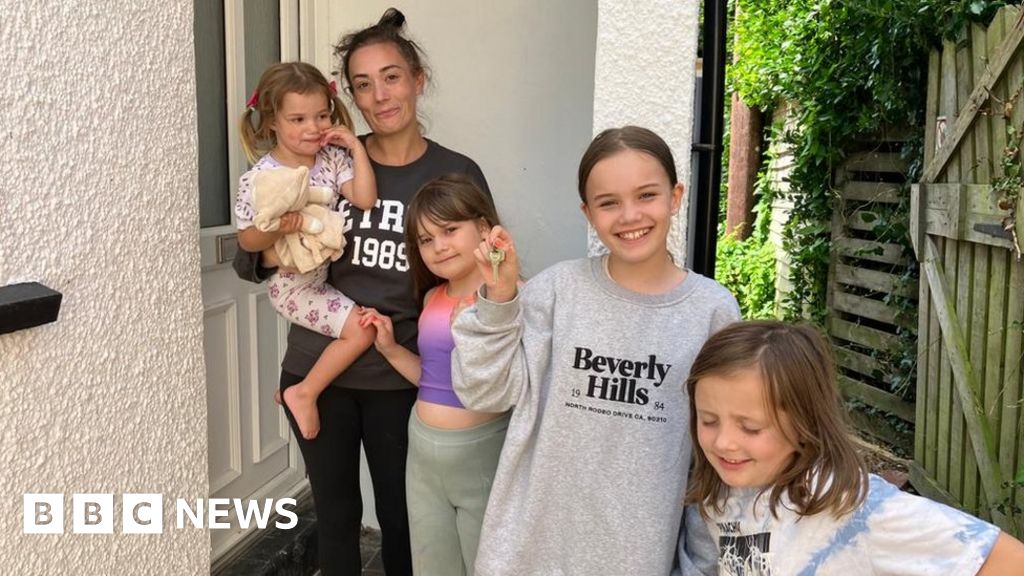 Family moves back home two years after fire - BBC News