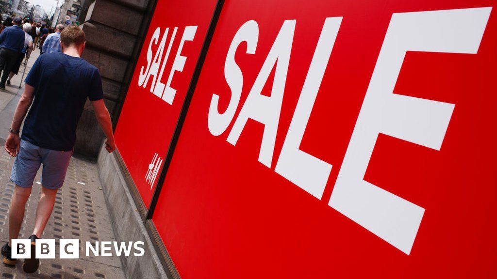 UK consumer spending growth 'falls to record low'