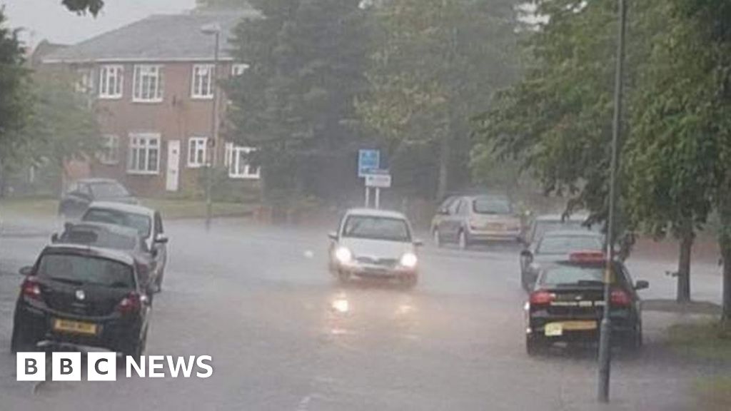 Midlands streets flooded and trains delayed as floods hit - BBC News