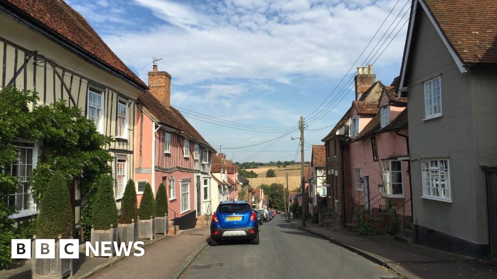 The village building homes for young families - BBC News